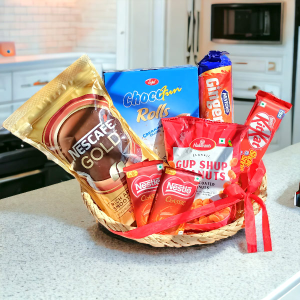 Nescafe packet with chocolates and ginger in Basket Gift | Gifts to ...