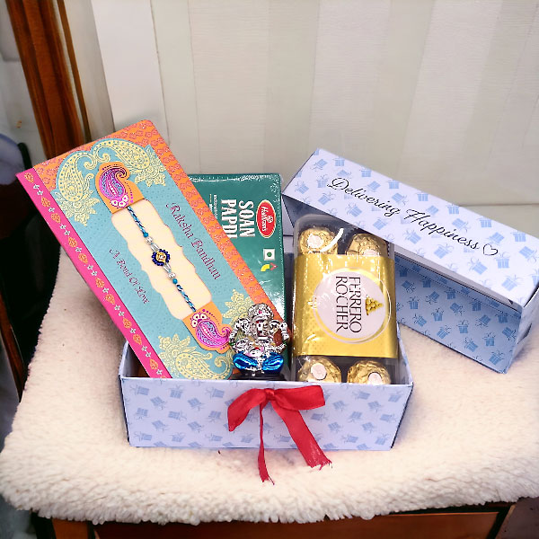 Ganesha Statue, Ferrero Chocolates, & Rakhi Greeting Card Combo | Gifts ...